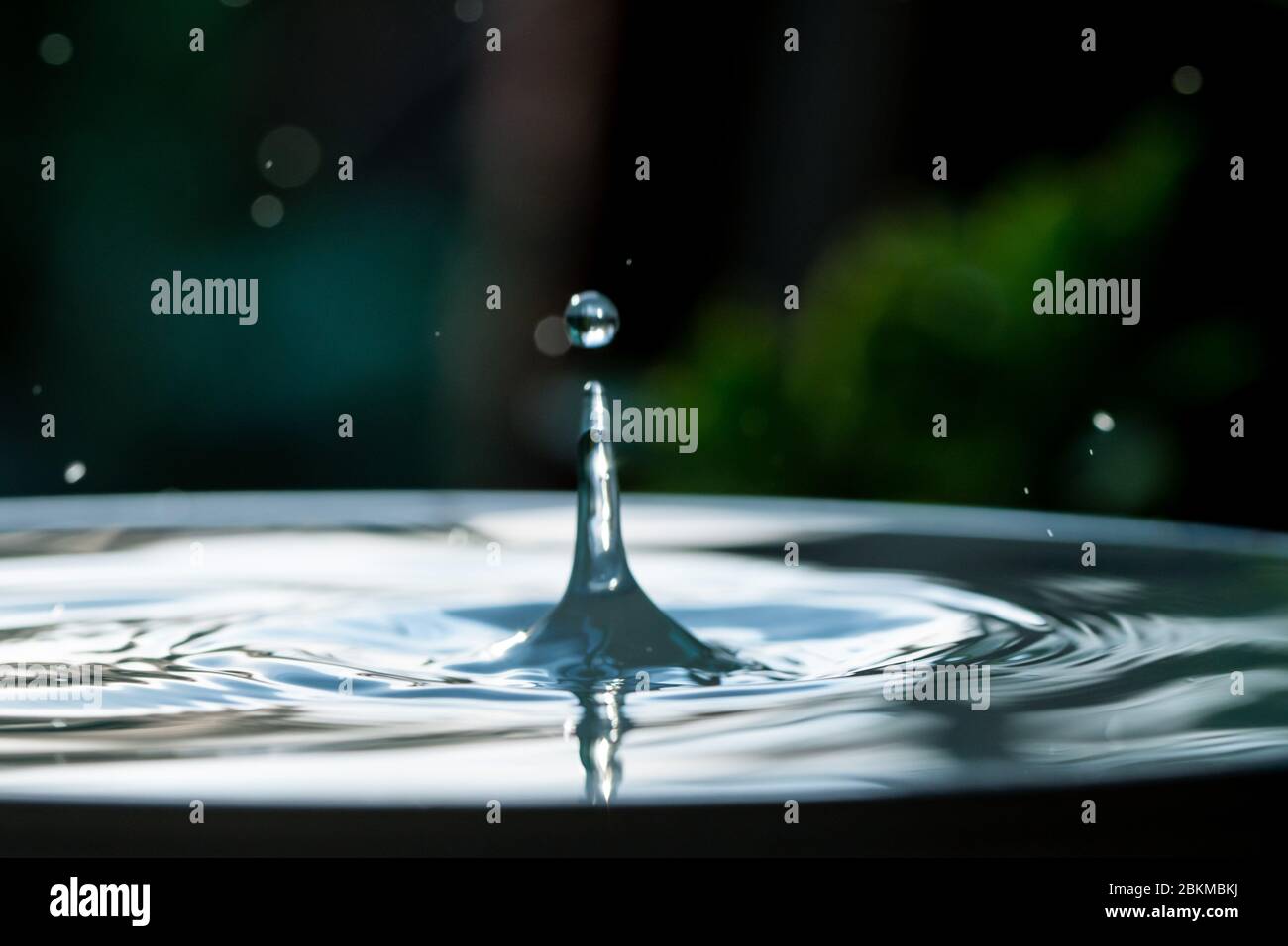Water Drop splash with sun Stock Photo - Alamy