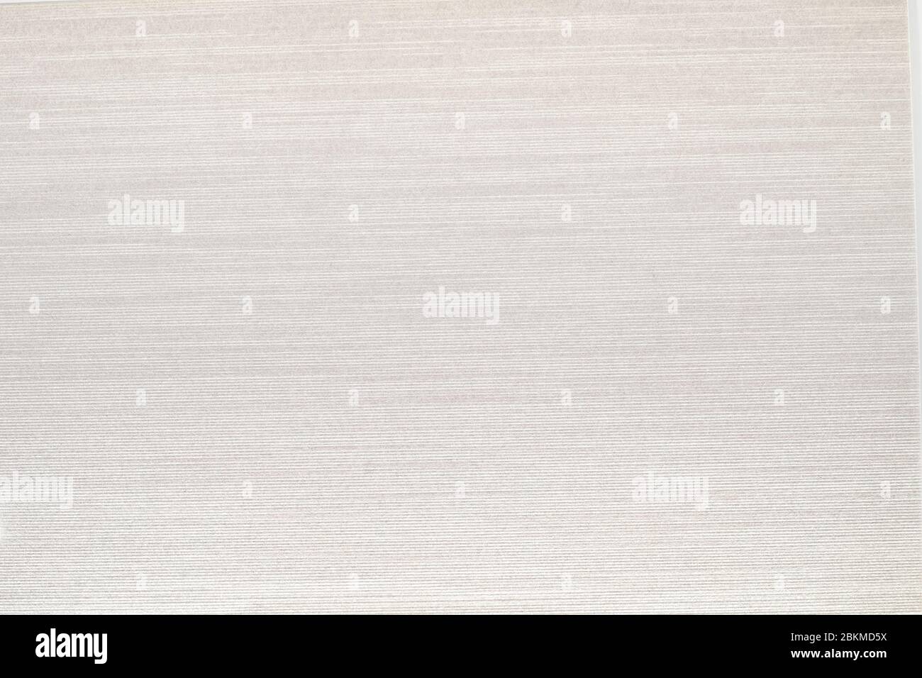 A dense industrial sheet of grey paper with a textured surface Stock ...