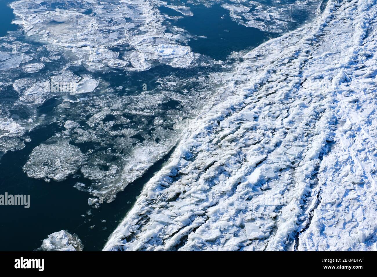 Ice floe floating on river in spring time Stock Photo - Alamy