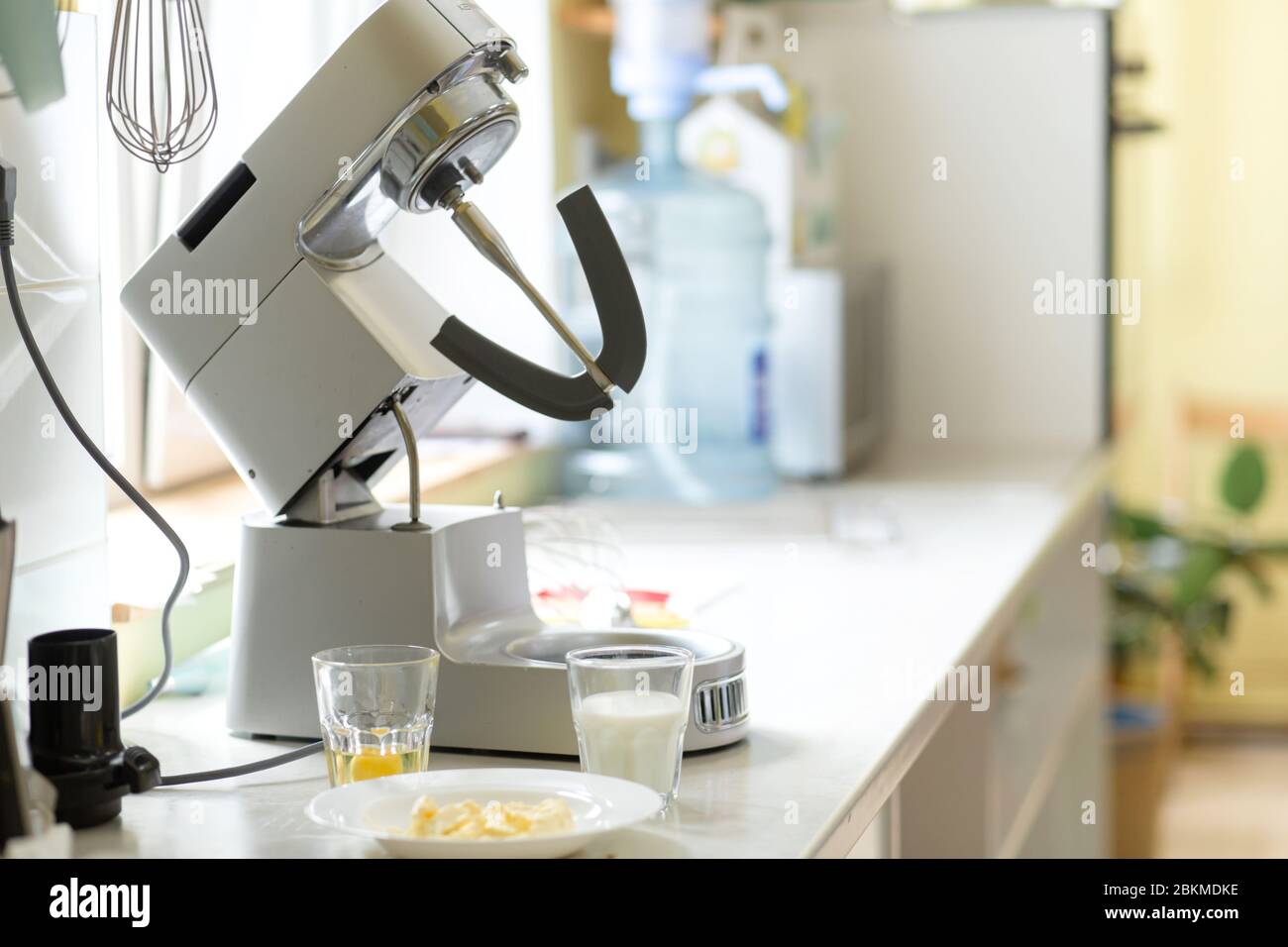 professional pastry chef preparing a dessert. Adds ingredients and ...