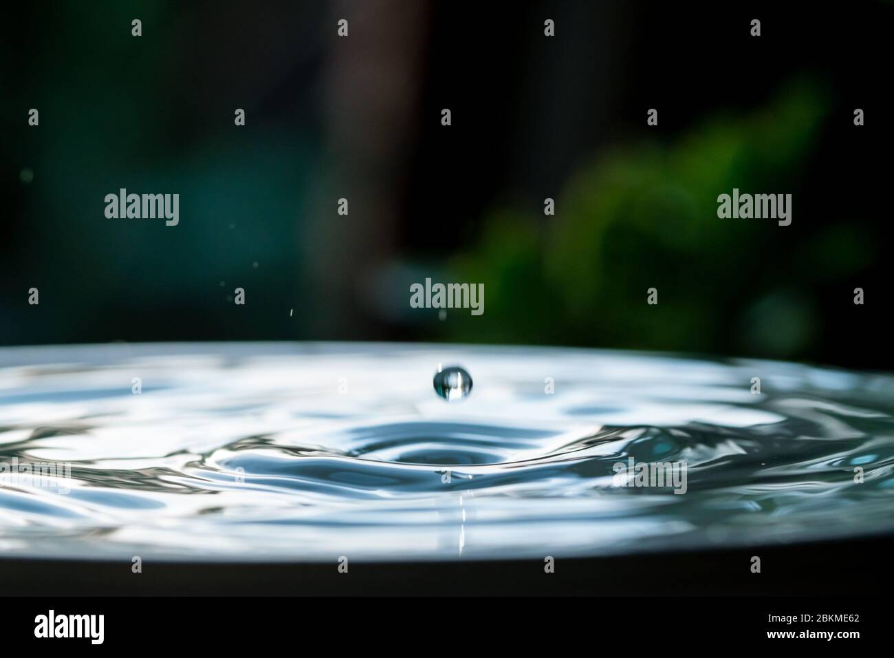 Water Drop splash with sun Stock Photo - Alamy
