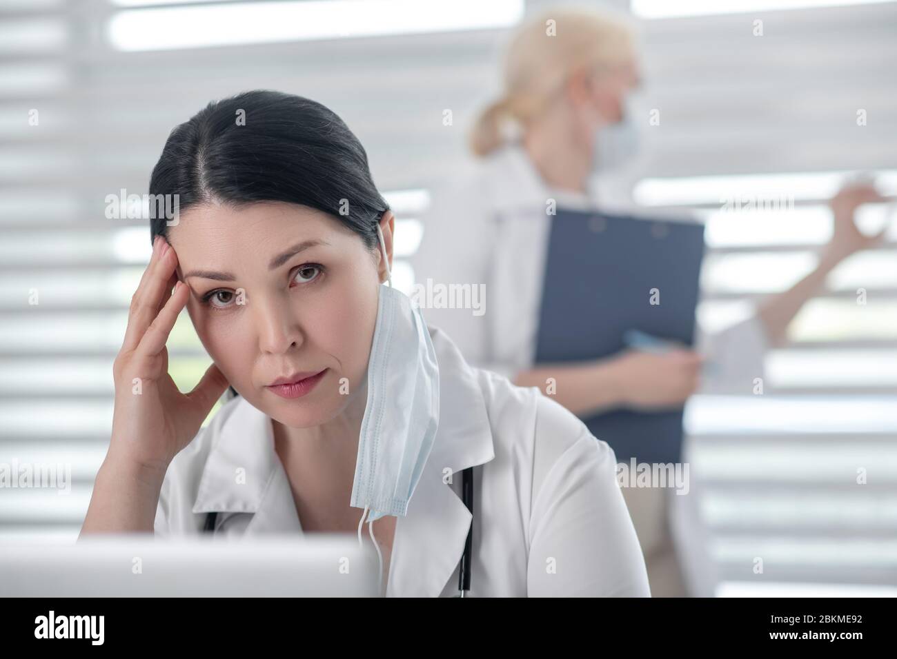 Professional woman working intently hi-res stock photography and images ...