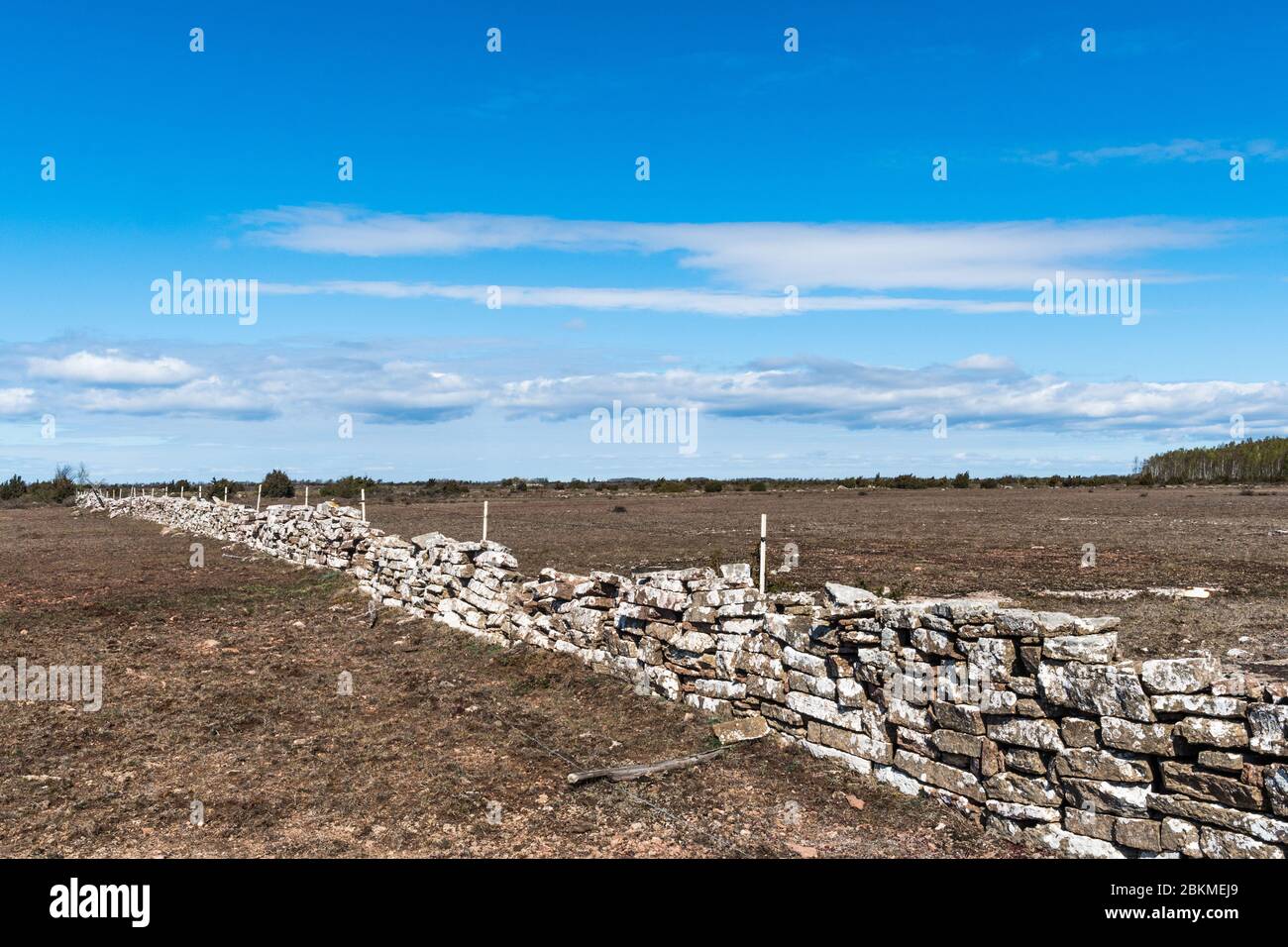 Boundry of a traditional dry stonewall in a great grassland Stora ...