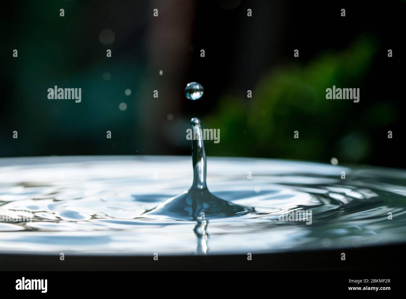 Water Drop splash with sun Stock Photo - Alamy