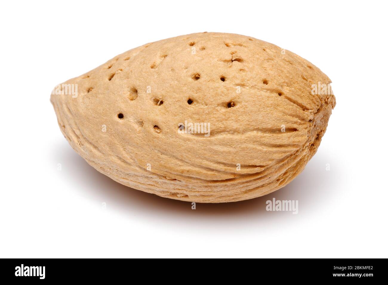 Single almond isolated on white background. Macro, studio shot Stock ...