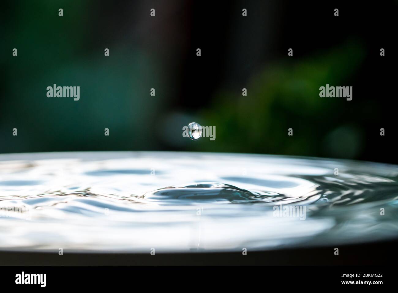 Water Drop splash with sun Stock Photo - Alamy