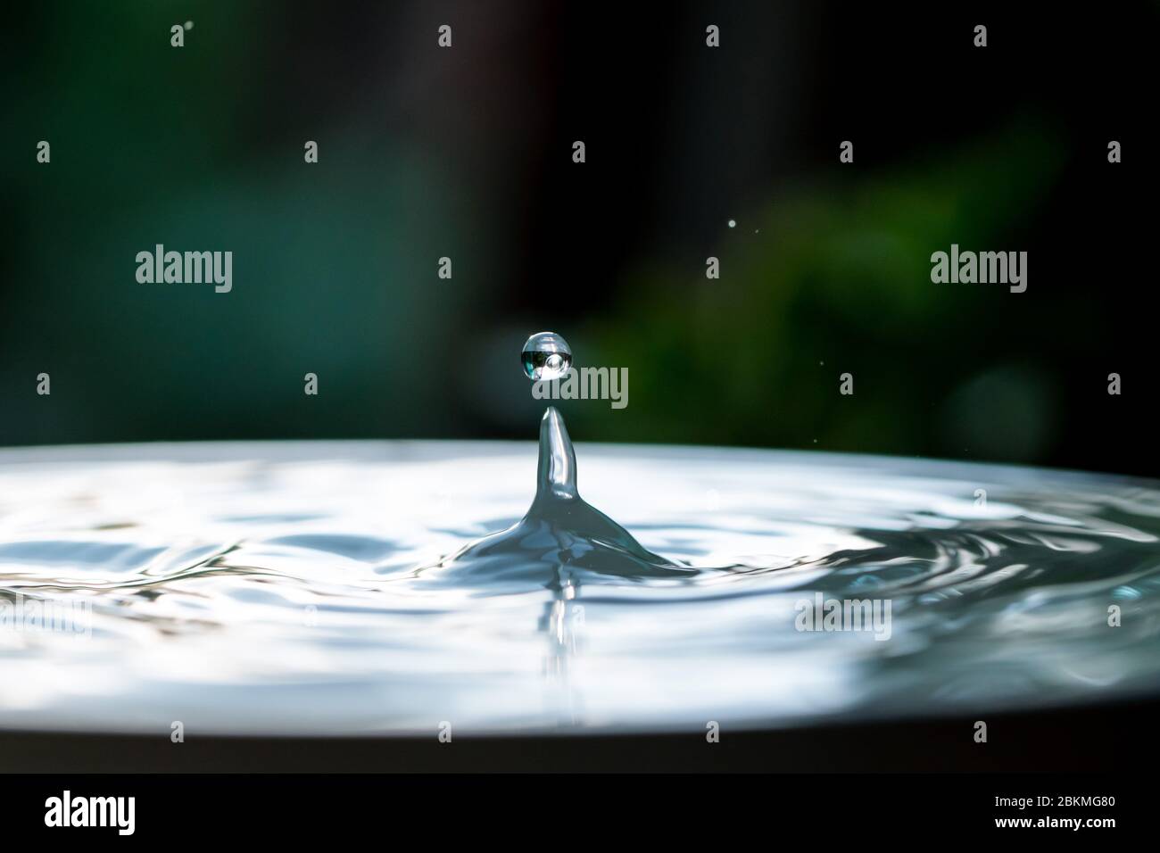 Water Drop splash with sun Stock Photo - Alamy