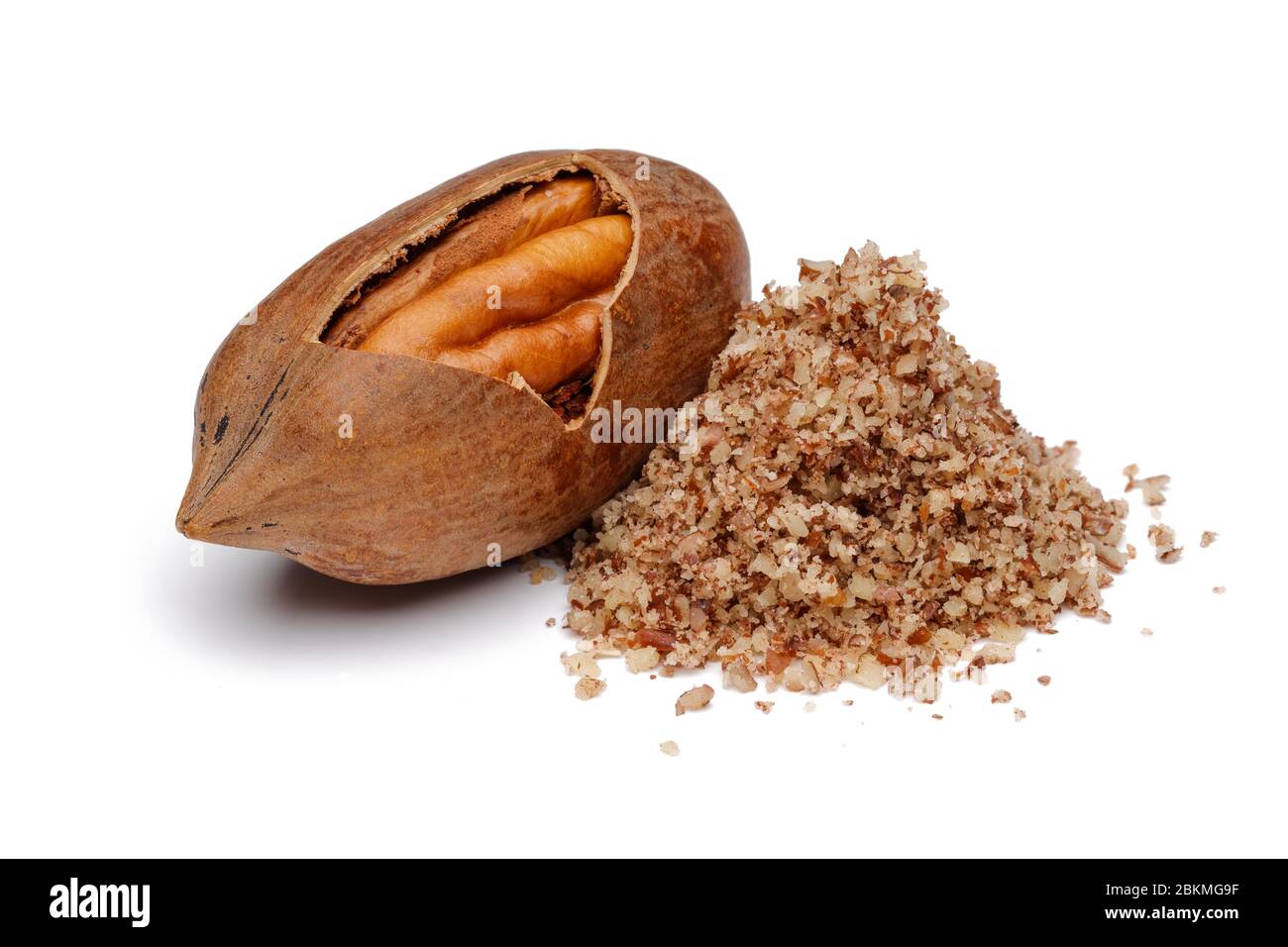 Heap of granulated pecan nut isolated on white background Stock Photo ...