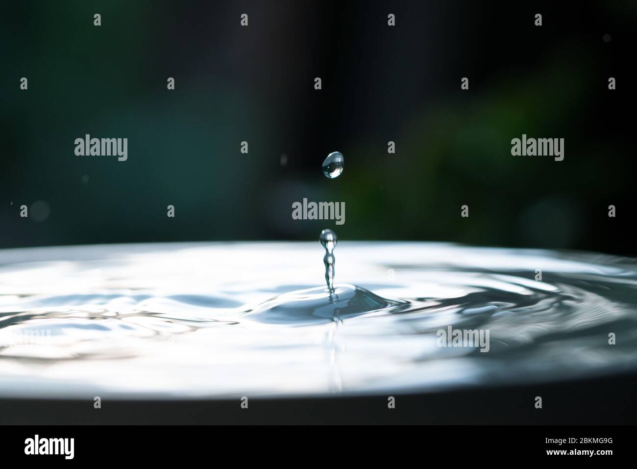 Water Drop splash with sun Stock Photo - Alamy