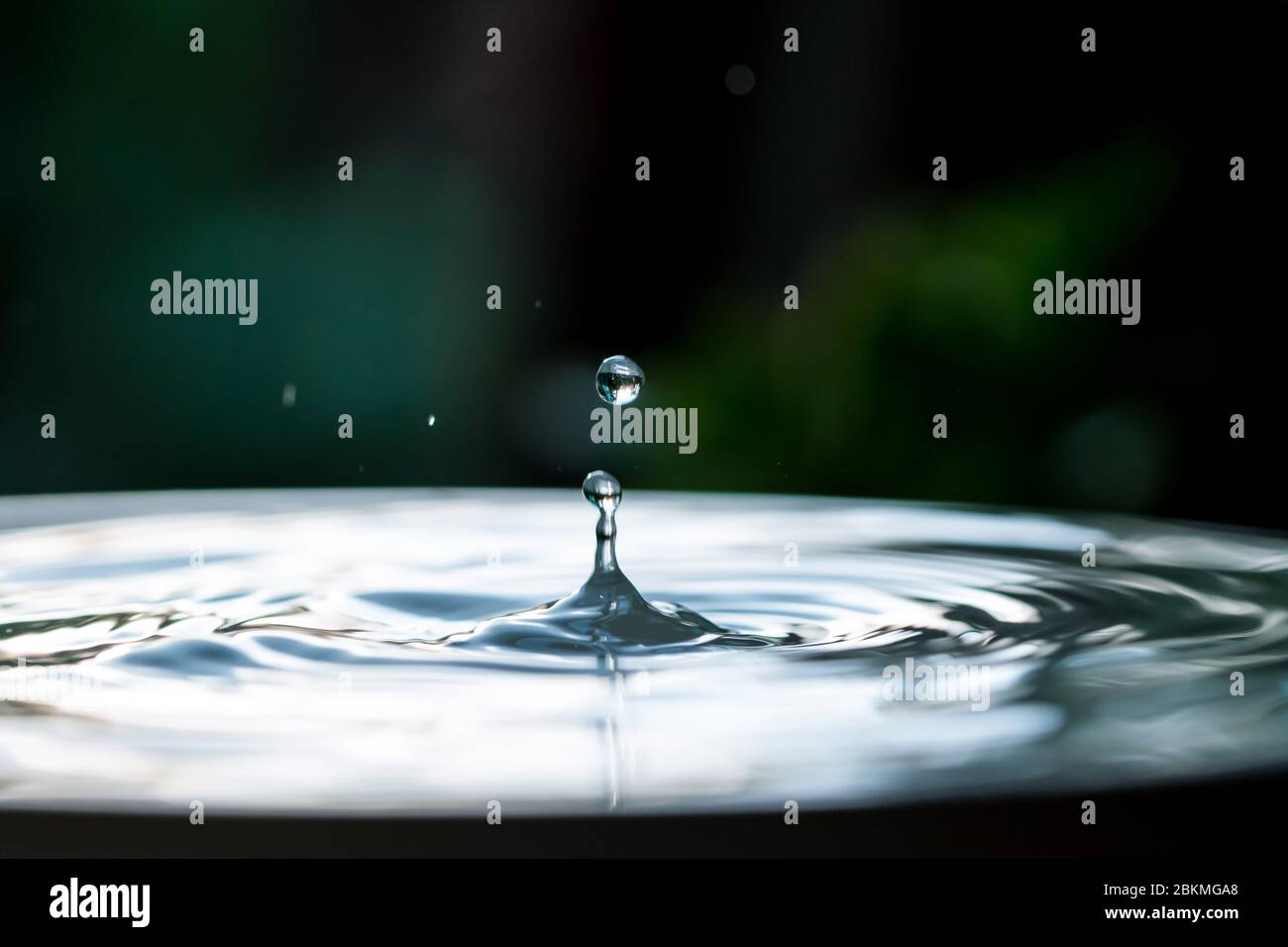 Water Drop splash with sun Stock Photo - Alamy