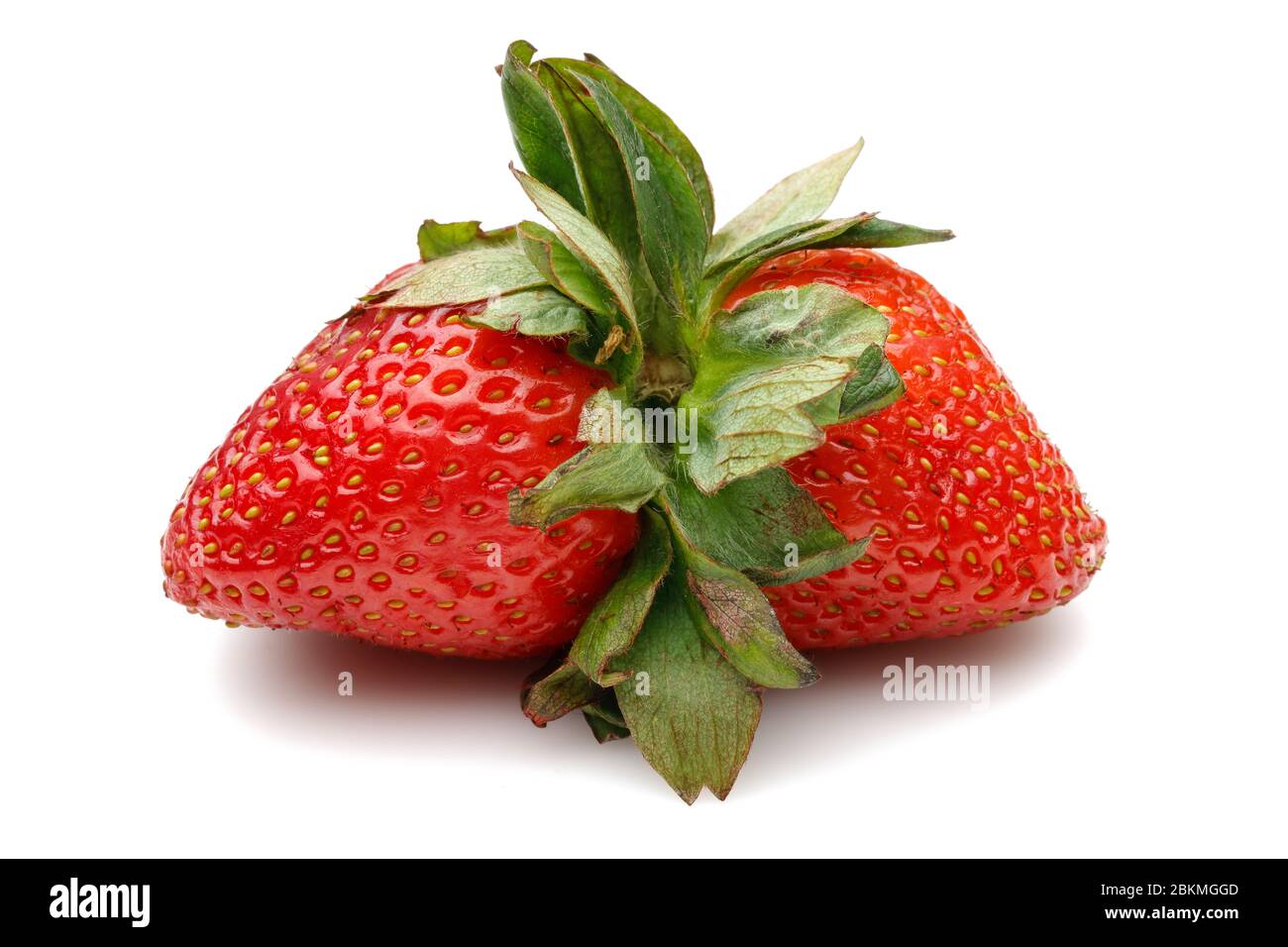 Twin strawberry isolated on white background Stock Photo - Alamy