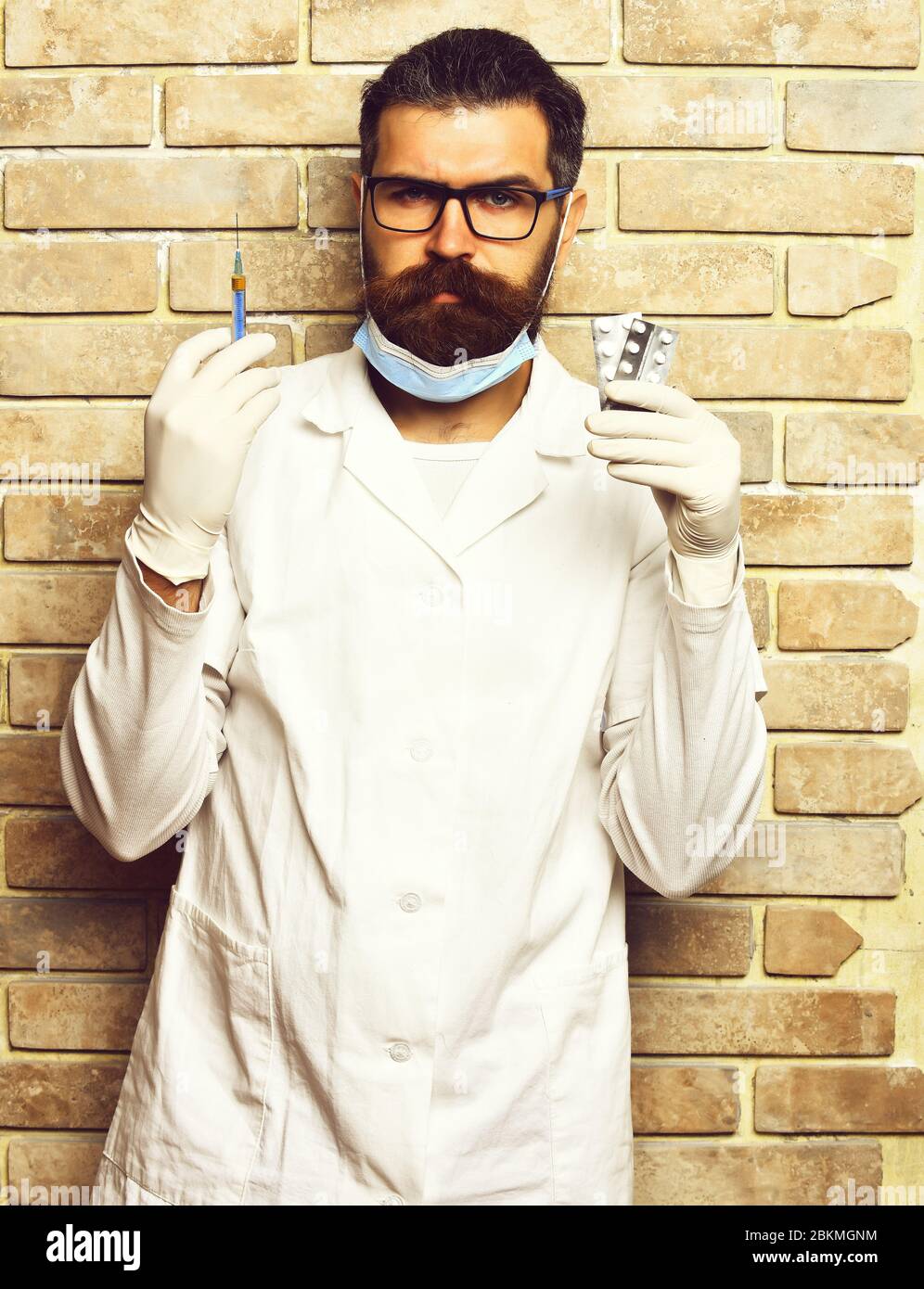 Bearded man, long beard. Brutal caucasian doctor or unshaven hipster ...