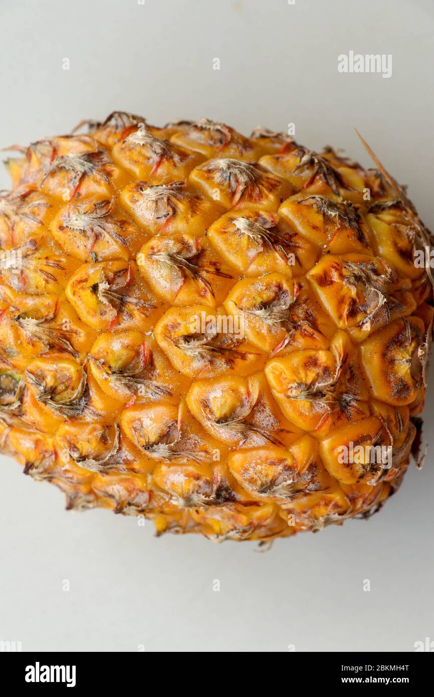Close-up of skin of ripe pineapple. Fresh pineapple texture. Abstract ...