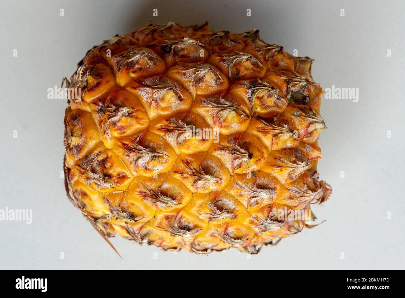 Close-up of skin of ripe pineapple. Fresh pineapple texture. Abstract ...