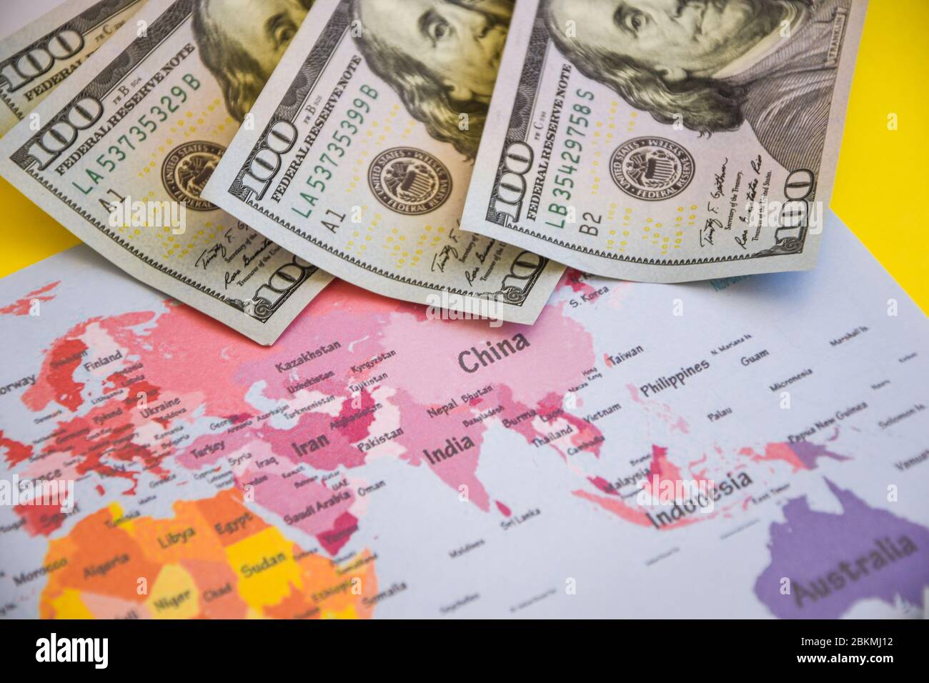 Pile of dollars near USA on world map, money, dollar and world map view ...