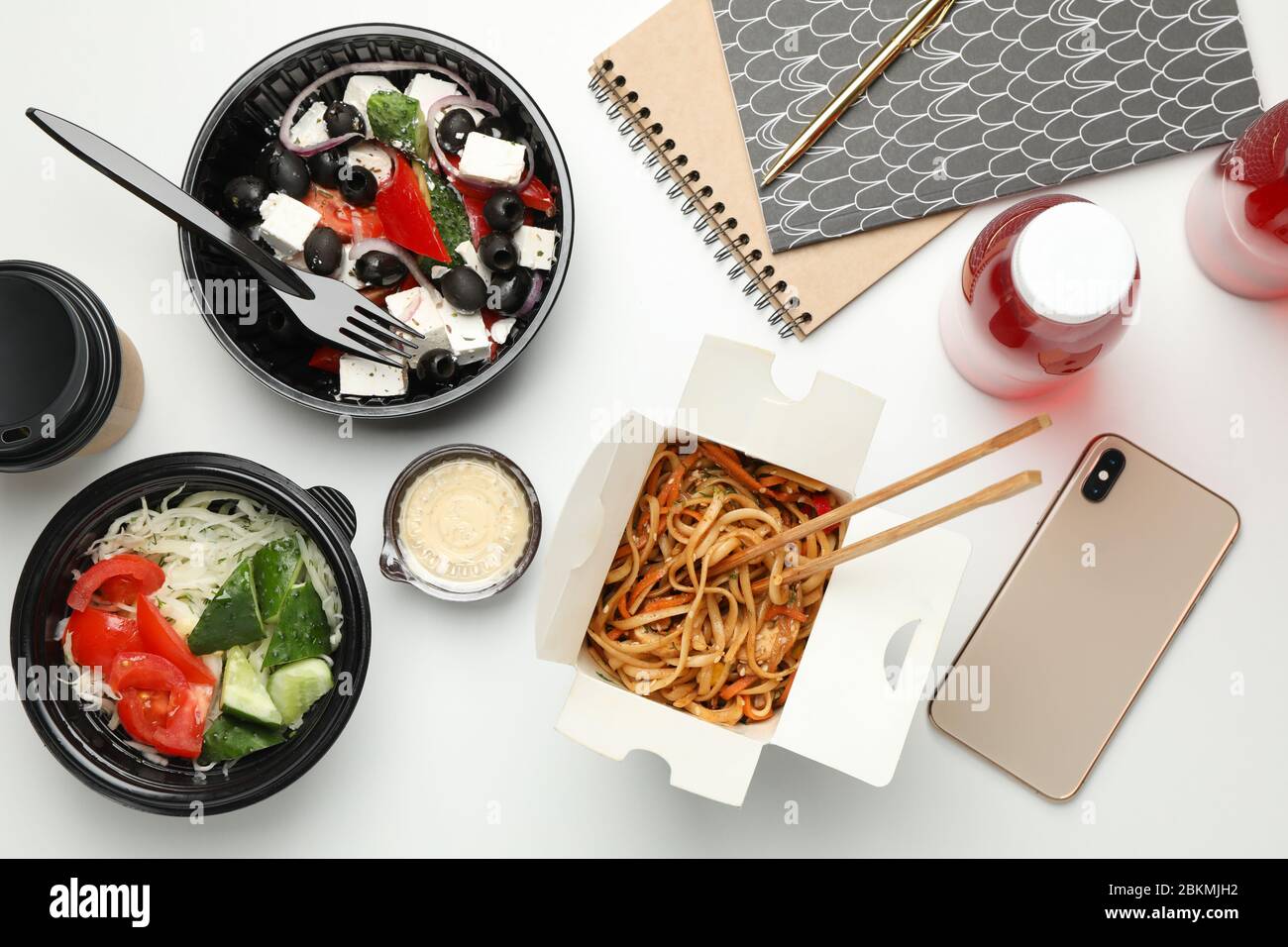 Food delivery. Takeaway food on white background Stock Photo - Alamy