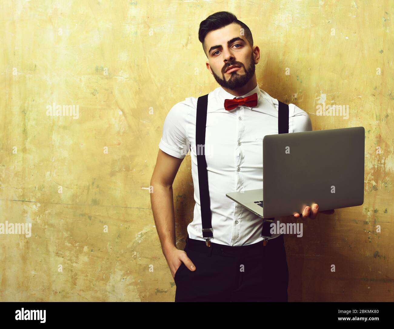 Manager with beard and confident face expression wearing white shirt ...