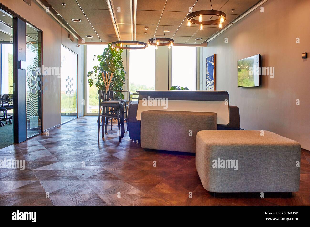 Modern common area in new office building Stock Photo - Alamy