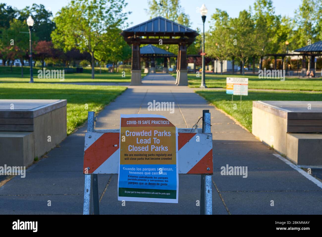 A health notice cautions public to abide by social distancing and ...