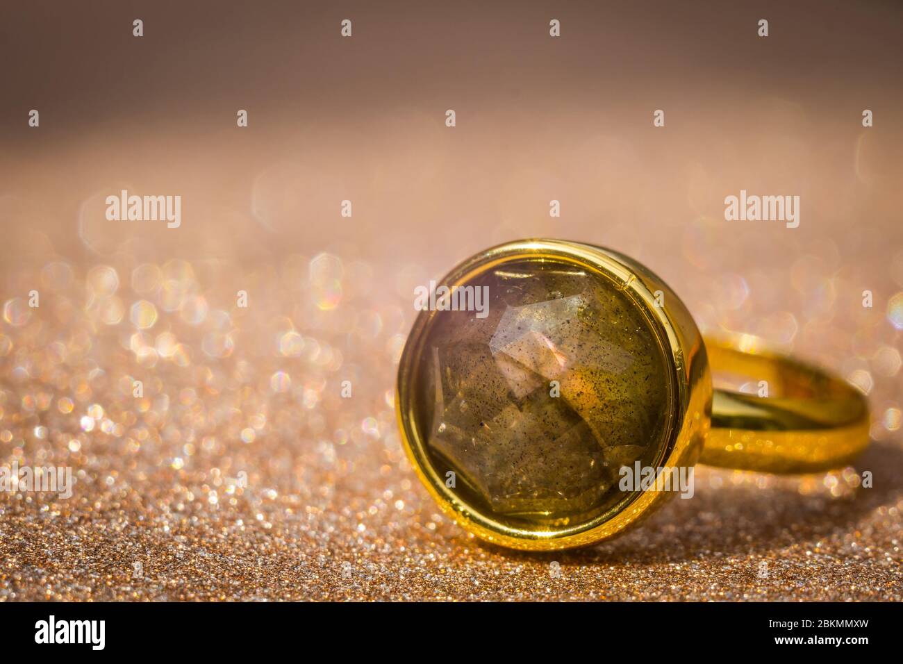 Fashion golden ring decorated with natural grey labradorite stone Stock ...