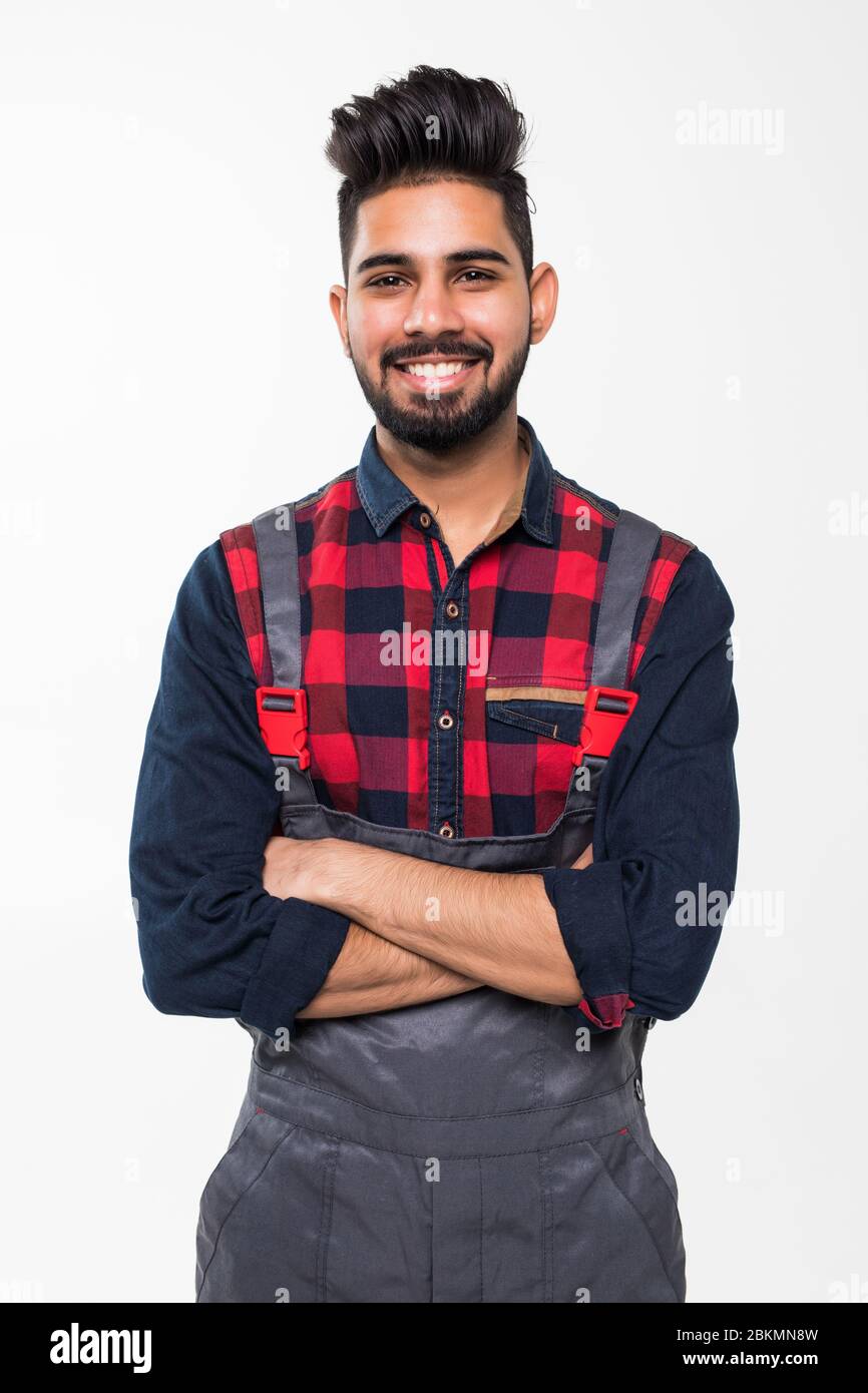 Portrait of smiling worker in blue uniform isolated on white background ...