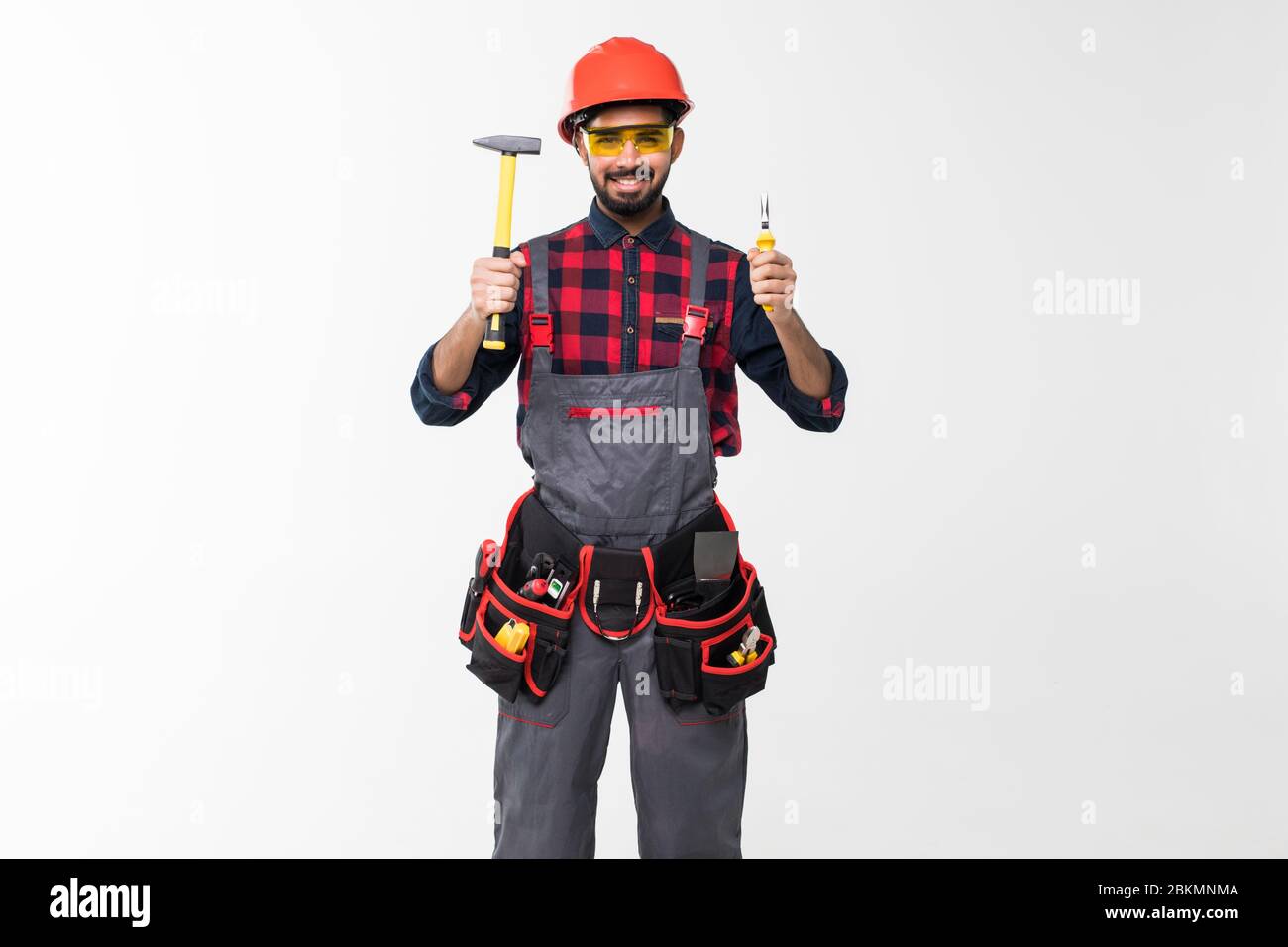 Professional handyman with construction tools. House renovation Stock ...
