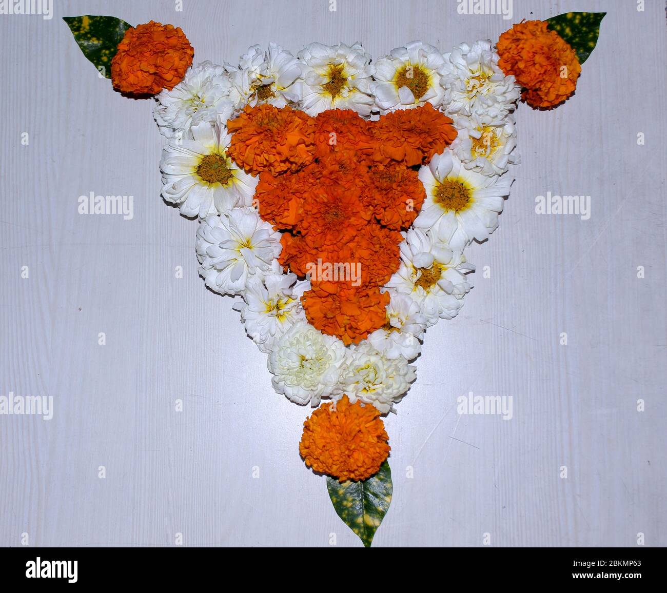Beautiful triangle flower design with marigold, chrysanthemum flower ...