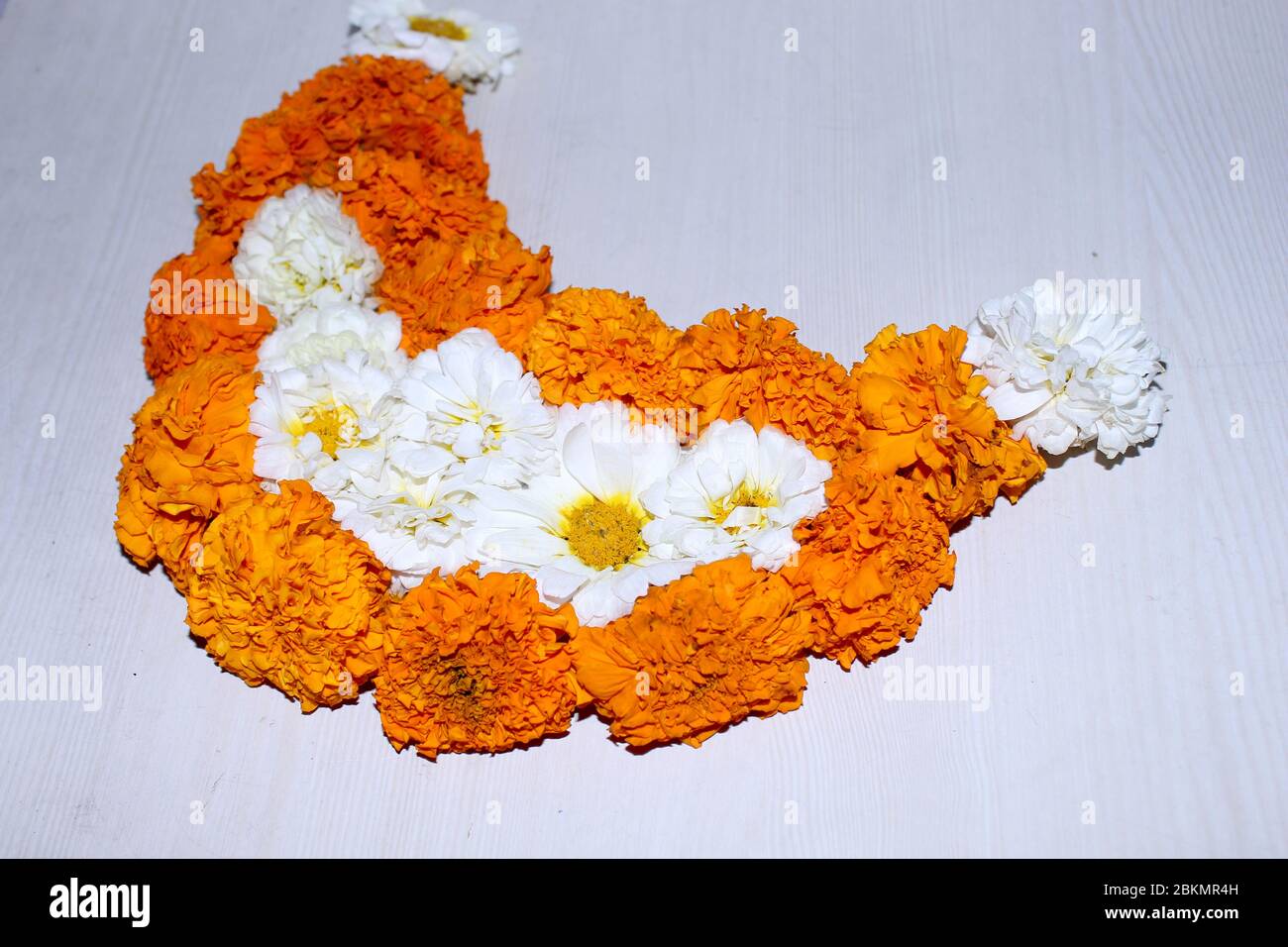 marigold and chrysanthemum flower moon design, rangoli, floral art ...