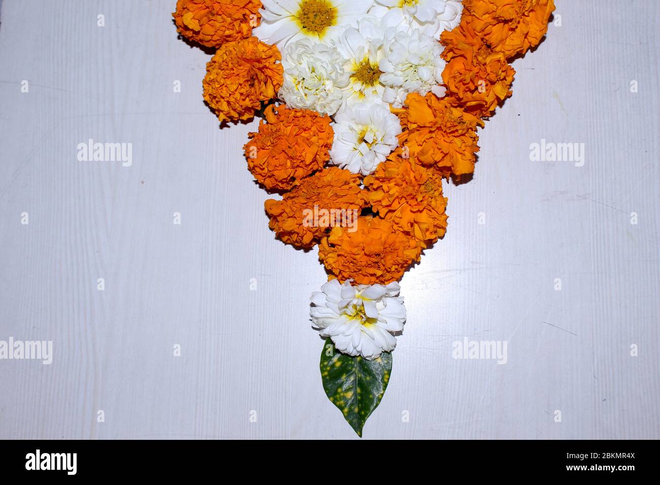 Beautiful triangle flower design with marigold, chrysanthemum flower ...