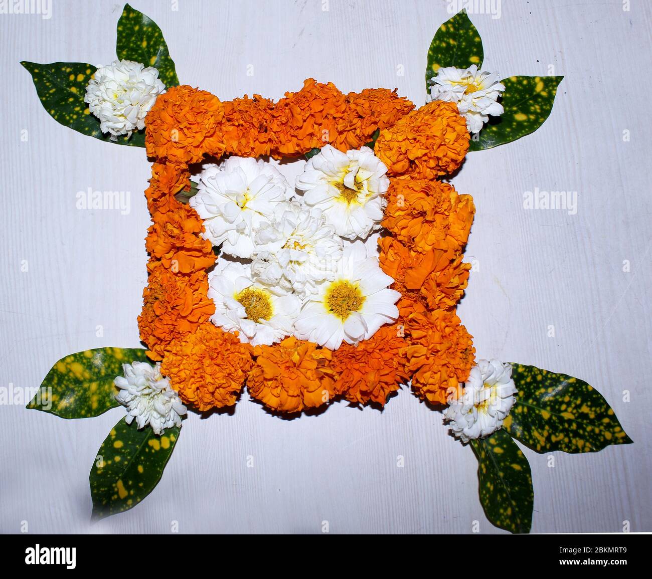 Rangoli Designs With Flowers And Leaves