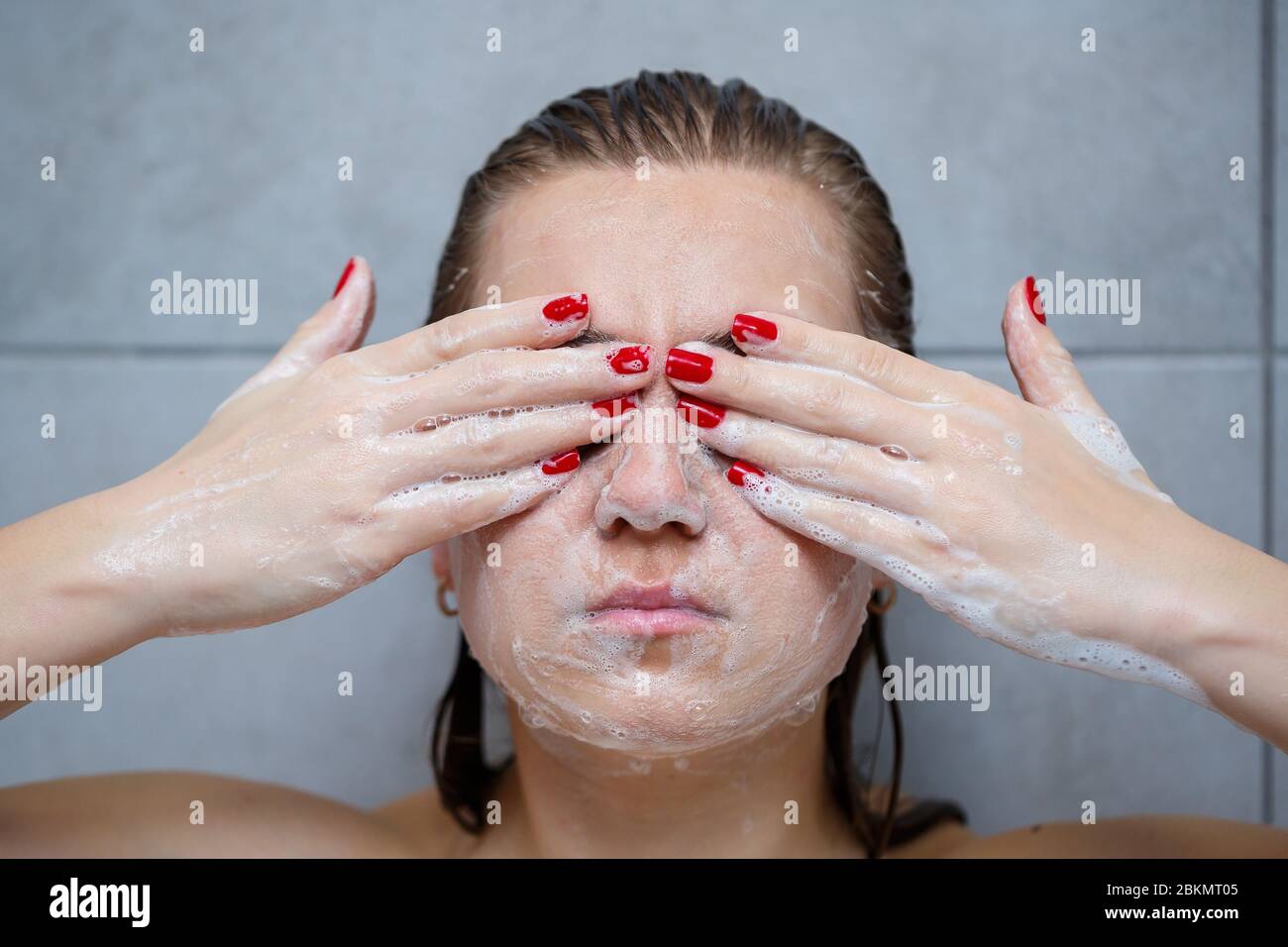 Face Skin Care Woman Applying Facial Cleanser On Face Closeup Girl