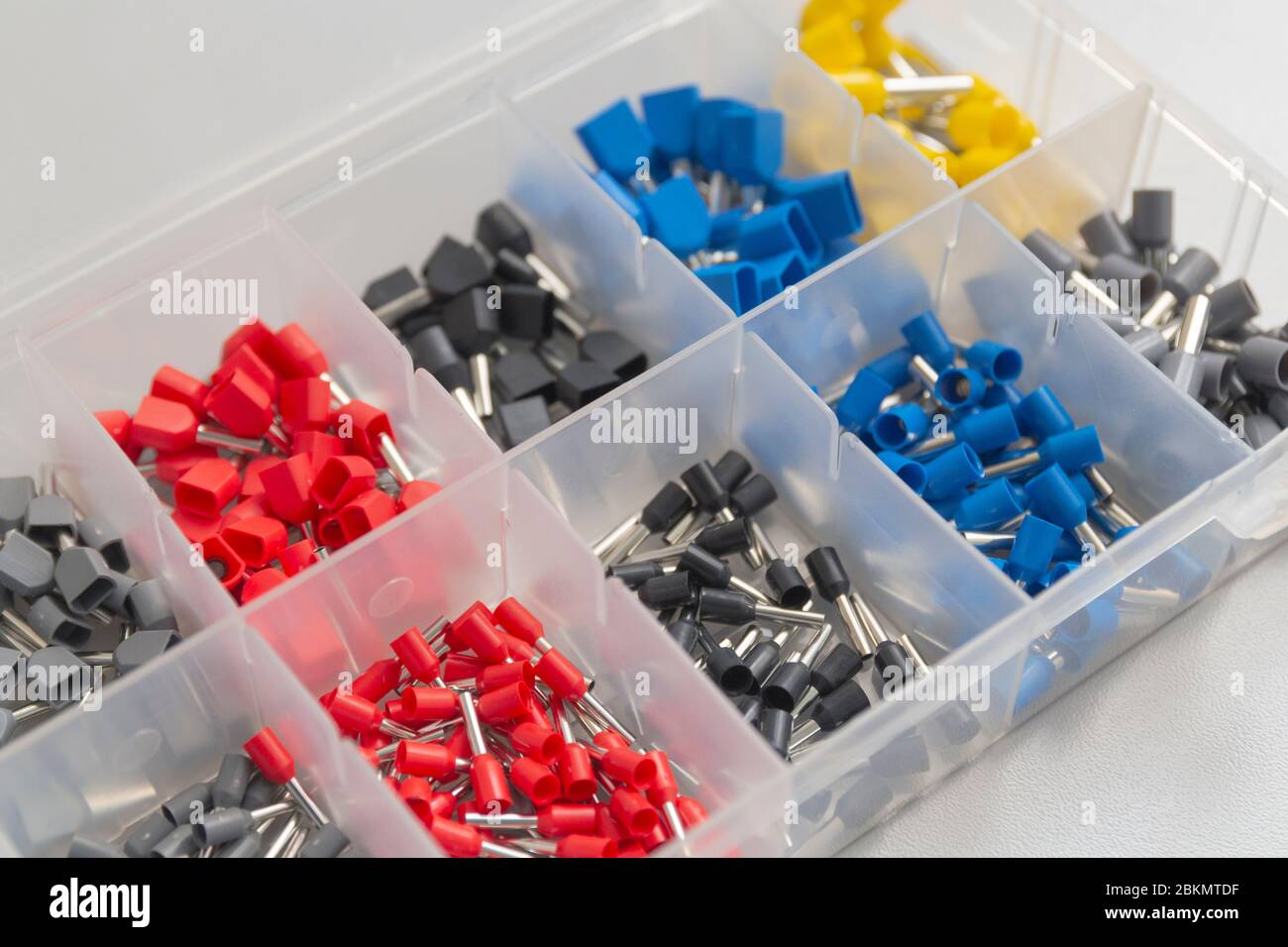Tips of different sizes and colors for crimping stranded electrical ...
