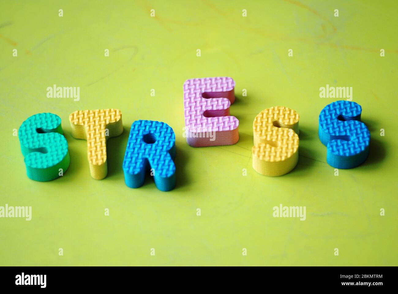 Stress letters on a table Stock Photo - Alamy