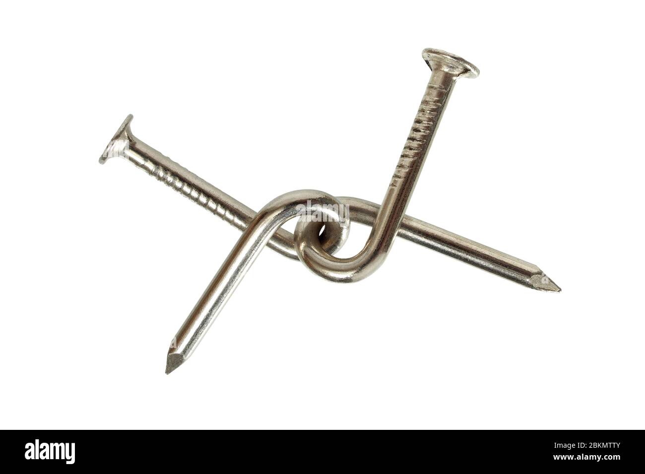 Classic nails puzzle on white background Stock Photo - Alamy