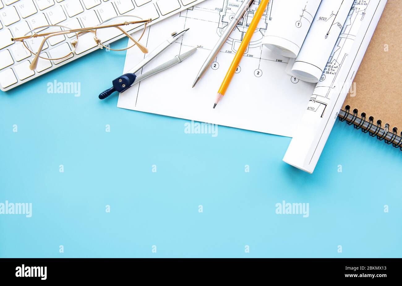 Architect workplace top view. Architectural project, blueprints ...