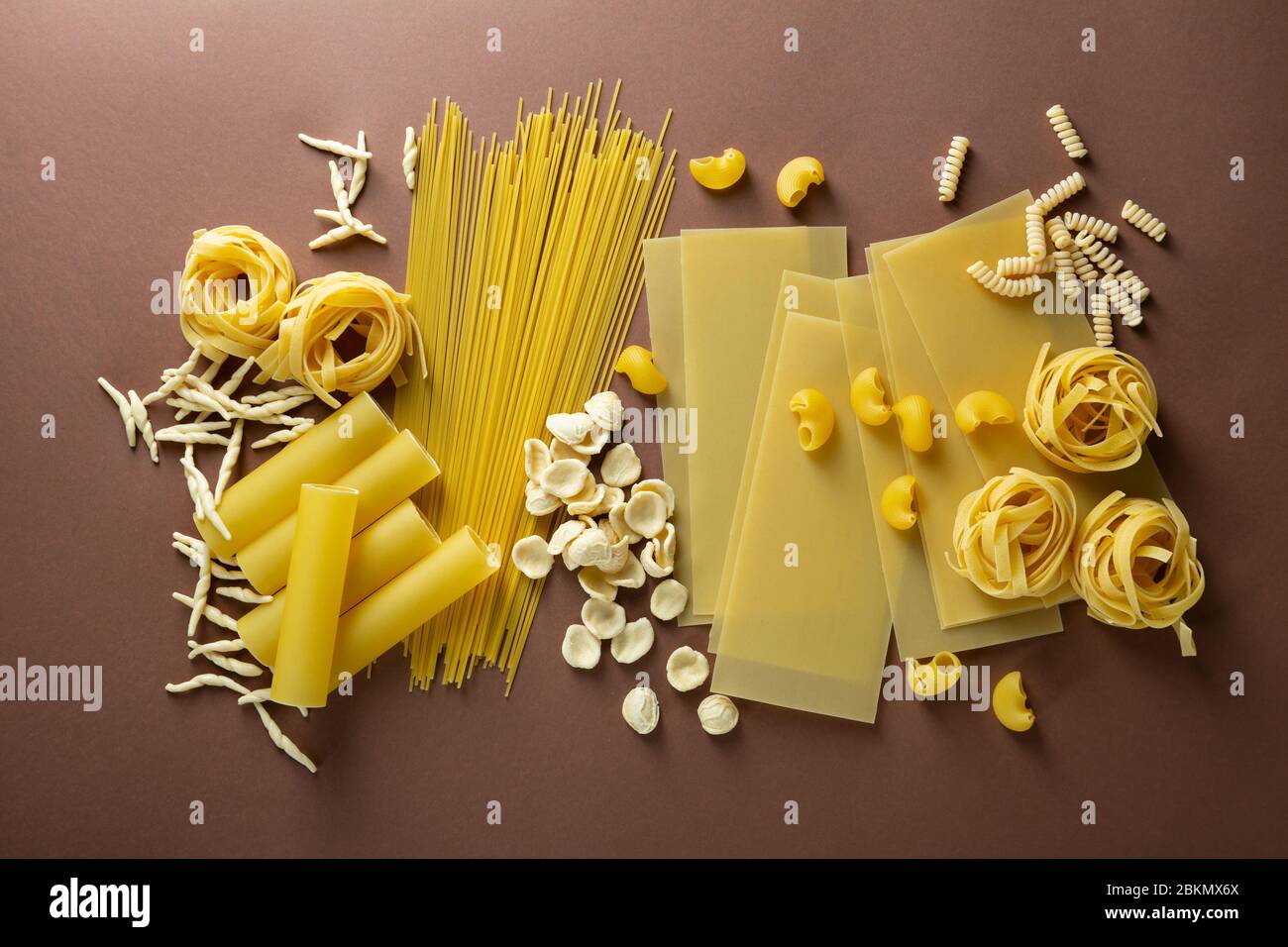 Variety of types and shapes of Italian dry pasta overhead view Stock ...