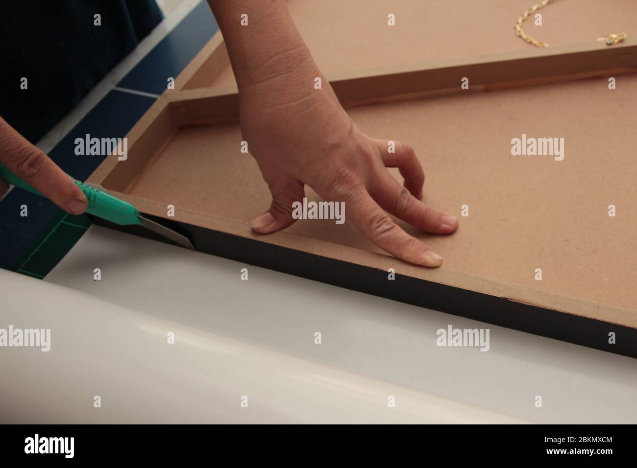 Photo Floating frame building in canvas art ,Hand cutter knife cut ...