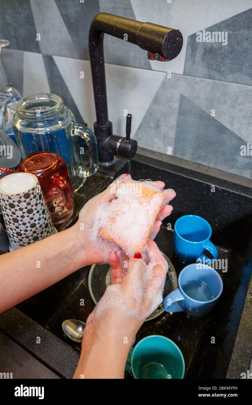 Washing Manually High Resolution Stock Photography and Images - Alamy