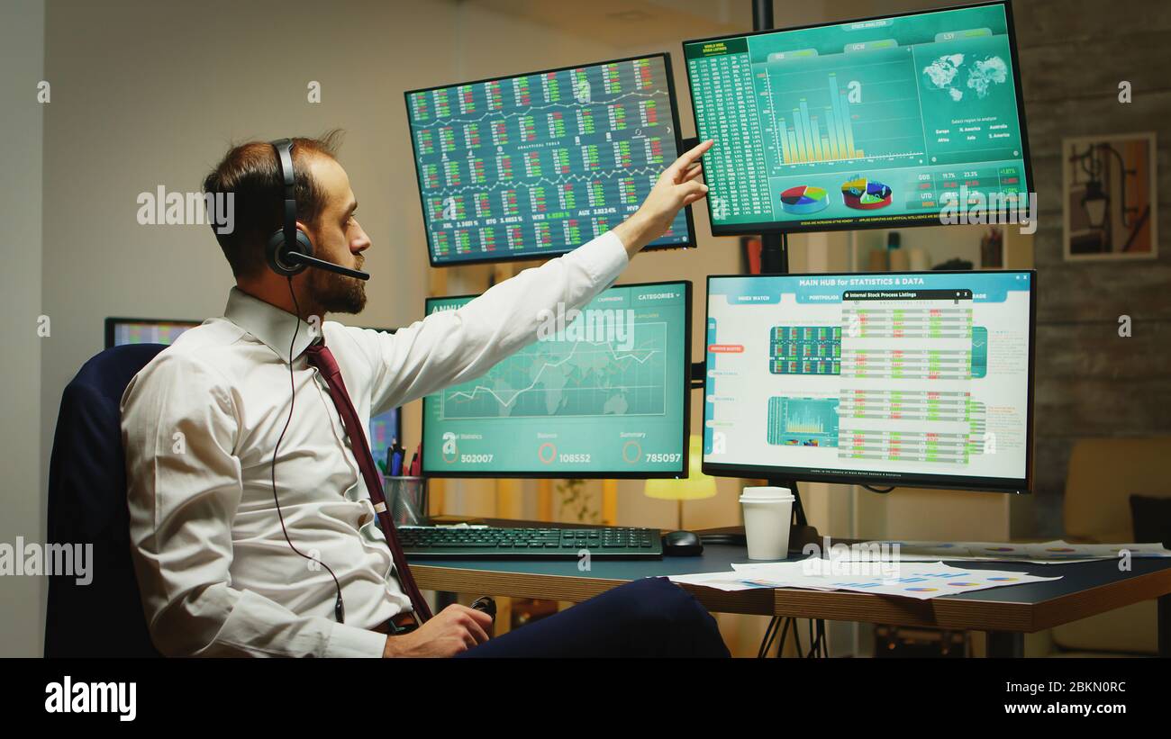 Angry businessman throwing graphs in the air because the stock market ...