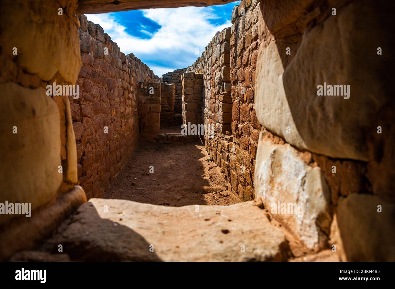 The unfinished ceremonial Sun Temple building rooms framed by a window ...
