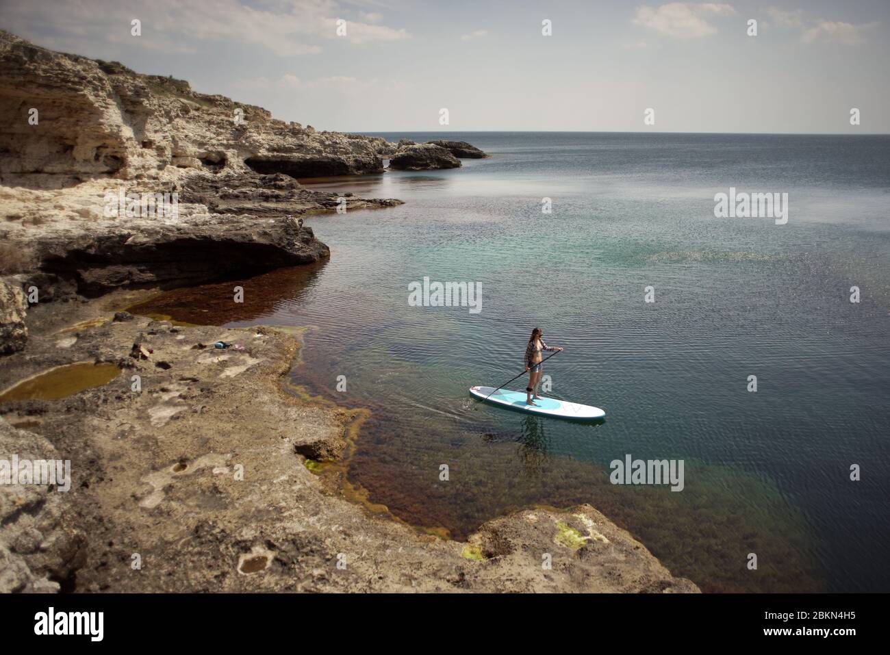 Woman silhouette on sup hi-res stock photography and images - Alamy