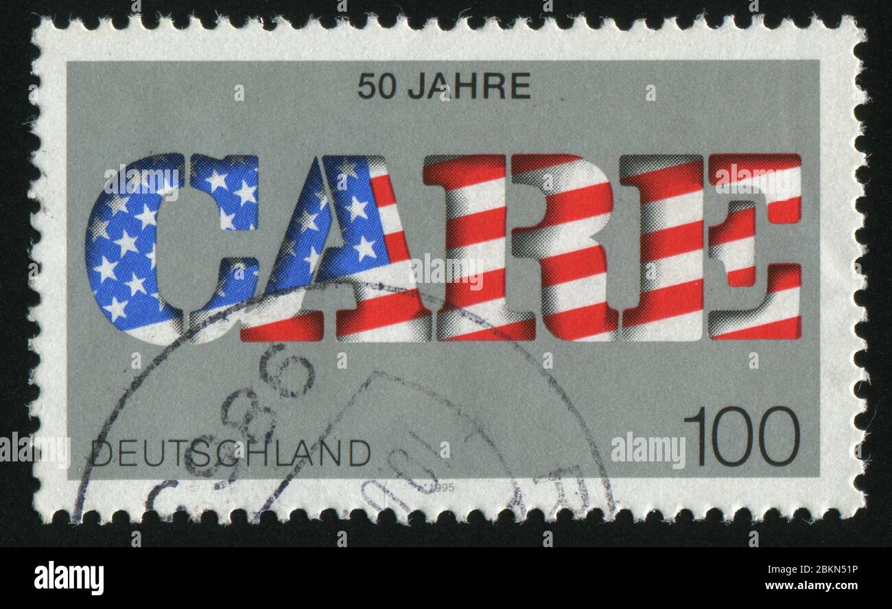 GERMANY- CIRCA 1995: stamp printed by Germany, shows text care 50th ...