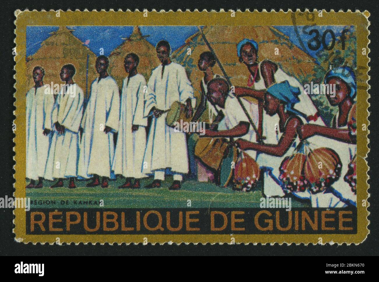 GUINEA - CIRCA 1984: stamp printed by Guinea, shows people in ...