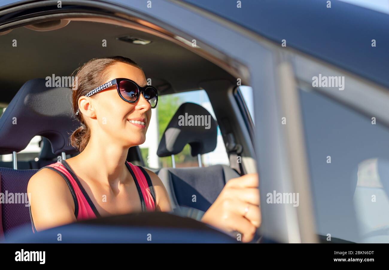 Girl driving car hands hi-res stock photography and images - Alamy