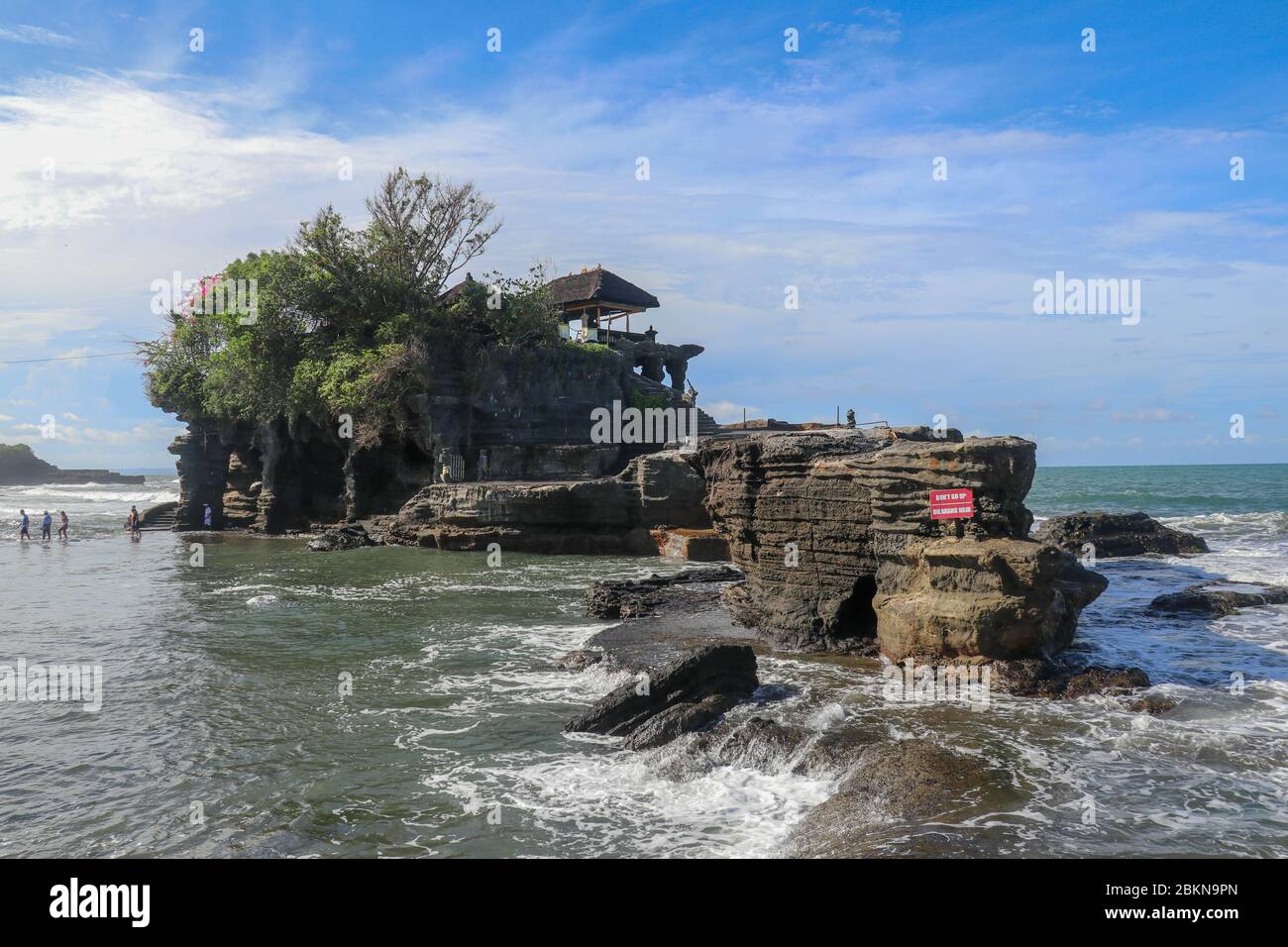 Sacred Balinese temple in Tanah Lot. Pura Batu Bolong on coastline with ...
