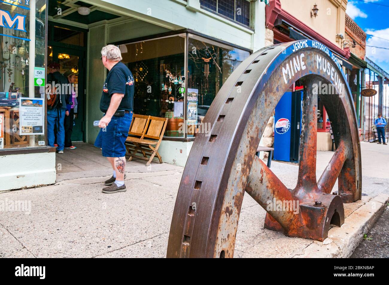 Old mine workings wheel outside the Jerome Mine Museum on Main Street ...