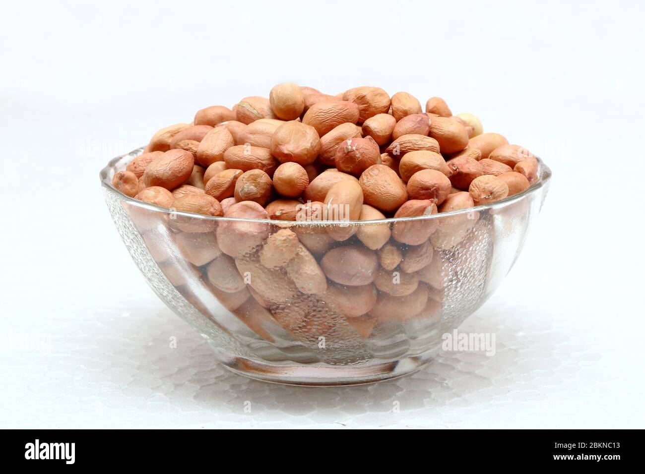 Raw peeled peanuts or groundnuts Stock Photo - Alamy