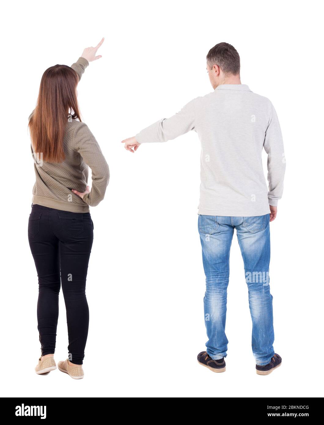 Back view of couple in sweater pointing. Rear view people collection ...