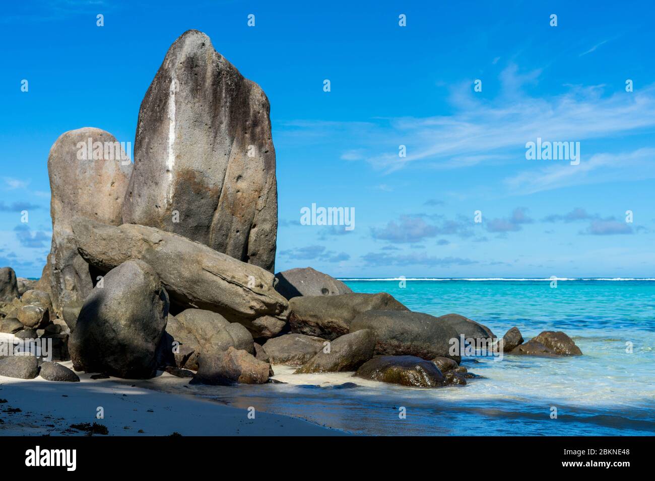 Natural granite rocks on the beach in Seychelles with the deep blue sky ...