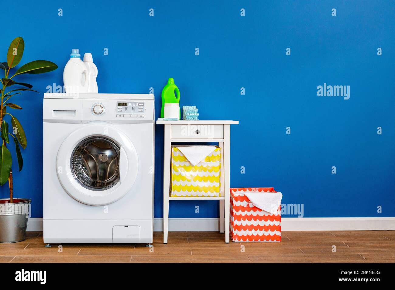 Laundry room. Close up of washing machine Stock Photo - Alamy